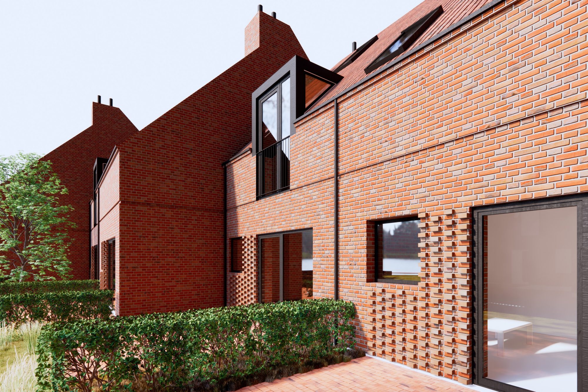 Autentisk tegl spiller sammen på Falens tag, facade og belægning